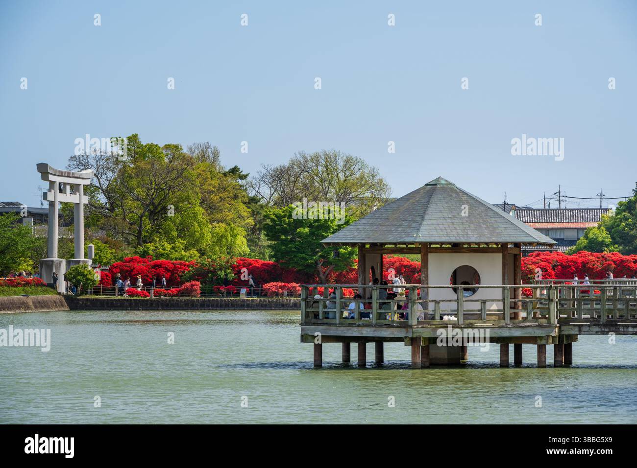 Nagaokakyo, Kyoto, Japan - April 27 2025 : Rokkaku-sha hexagonal gazebo on Hachijogaike Pond ...
