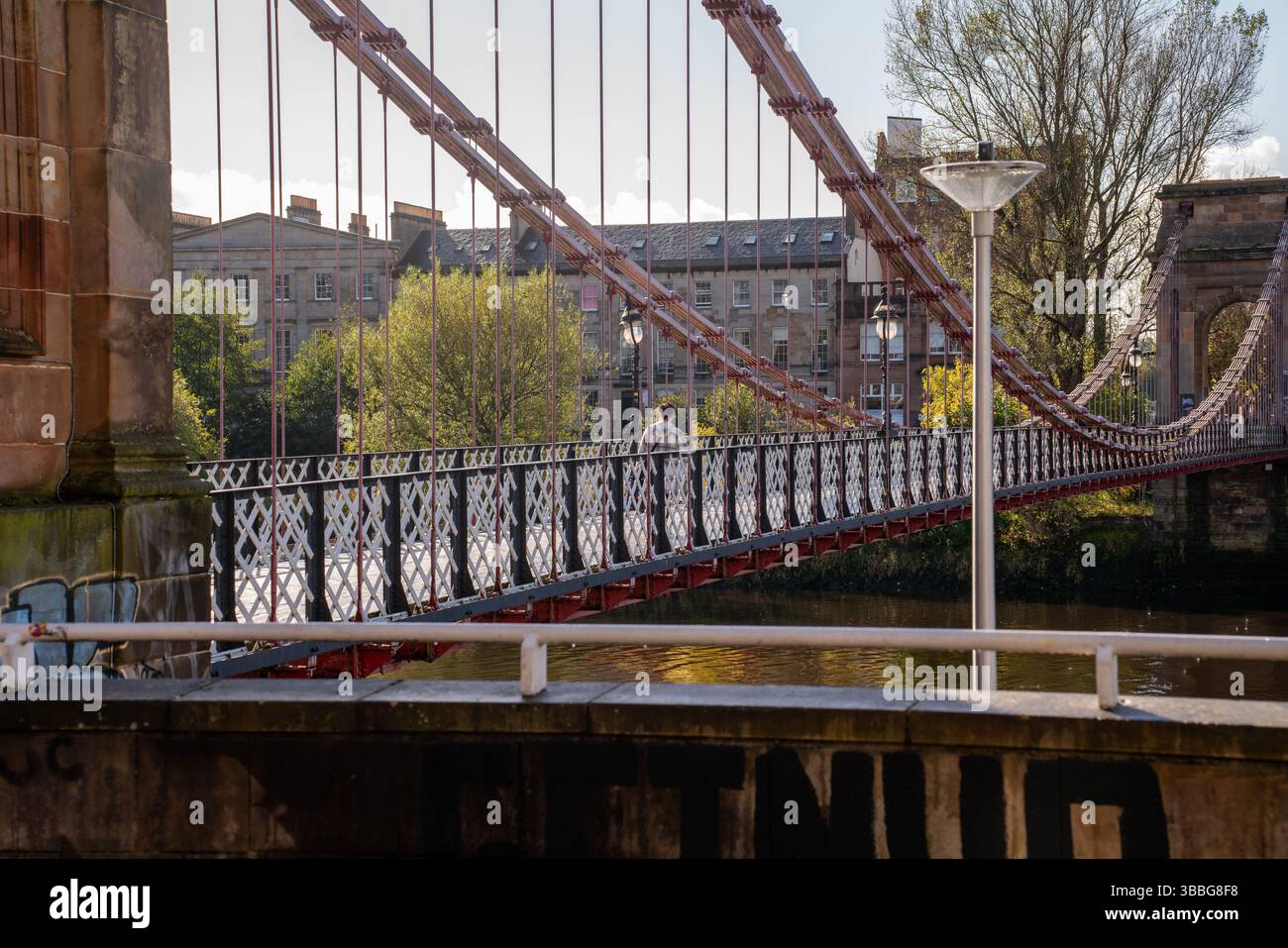 Historic suspension bridge over the River Clyde in Glasgow, with ...