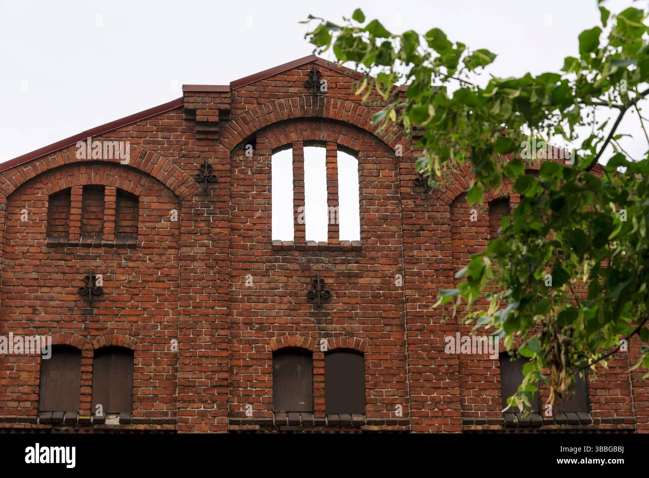 Brick building with empty windows Stock Photo - Alamy