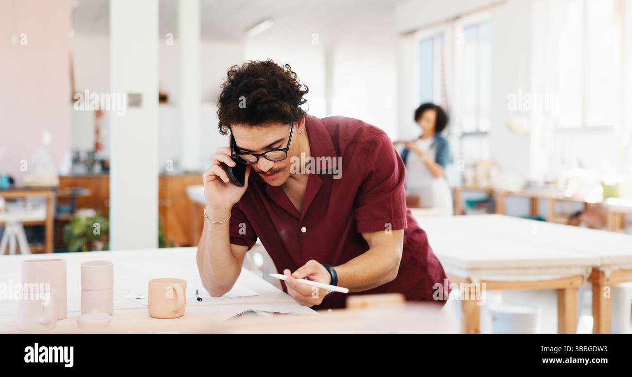 Phone call, pottery and man in workshop with tablet pen for inventory, schedule or order clay ...