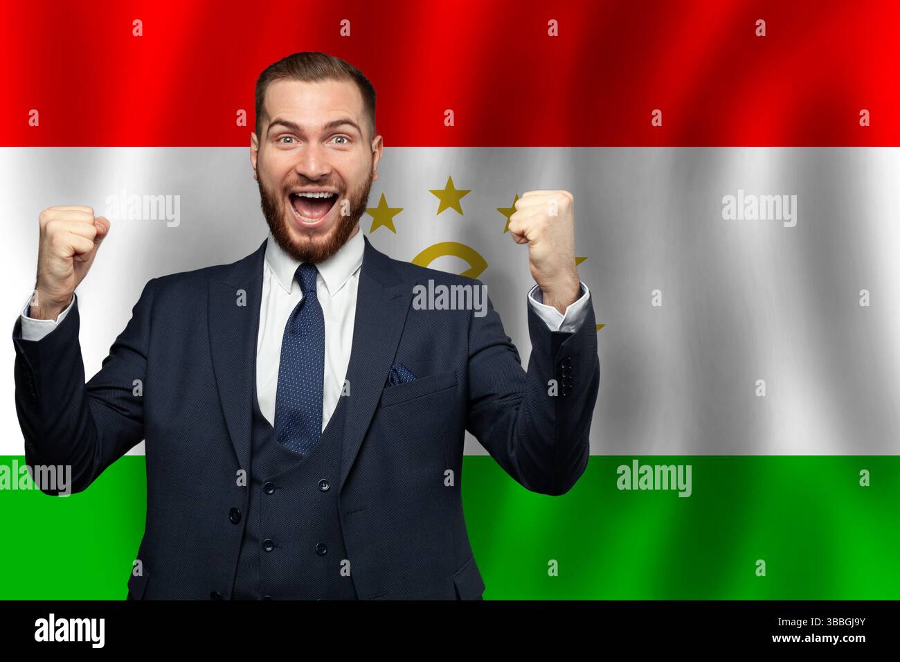Tajikistani happy businessman on the background of flag of Tajikistani ...