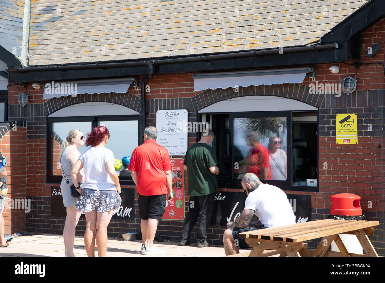 People queuing for coffee, Stokes Bay Stock Photo - Alamy