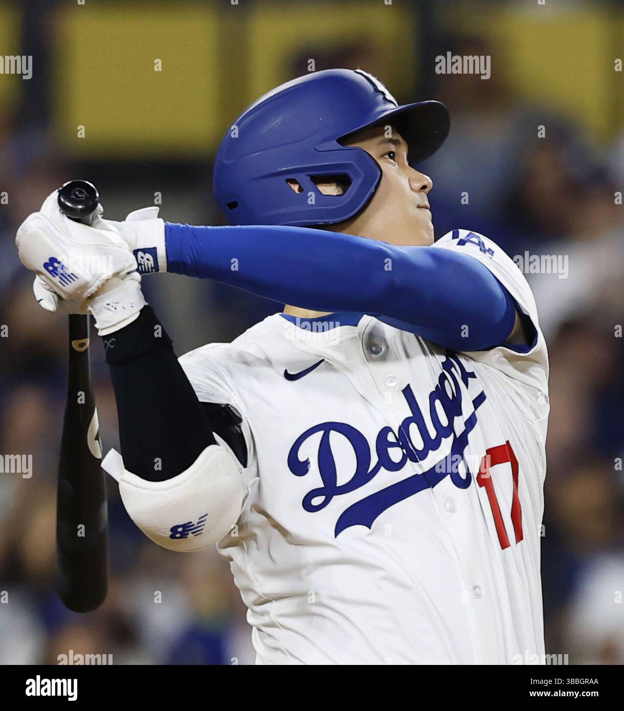 Los Angeles Dodgers designated hitter Shohei Ohtani hits a two-run home run in the fourth inning ...