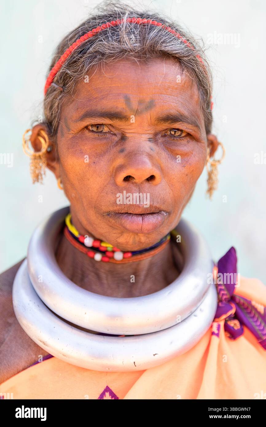 Portrait of a tribal woman with tattoes traditional dress with ...