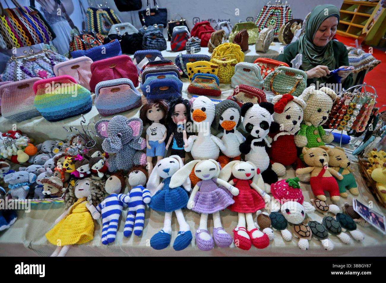 Beirut, Lebanon. 15th May, 2025. A woman displays products at the Made in Lebanon Exhibition ...