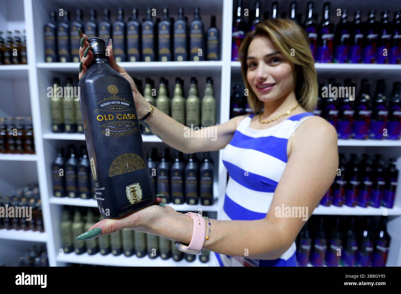 Beirut, Lebanon. 15th May, 2025. A woman displays a product at the Made ...