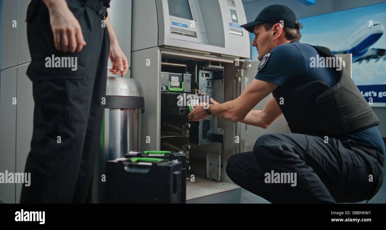 Professional Guards in Uniforms Performing ATM Encashment Procedure in ...