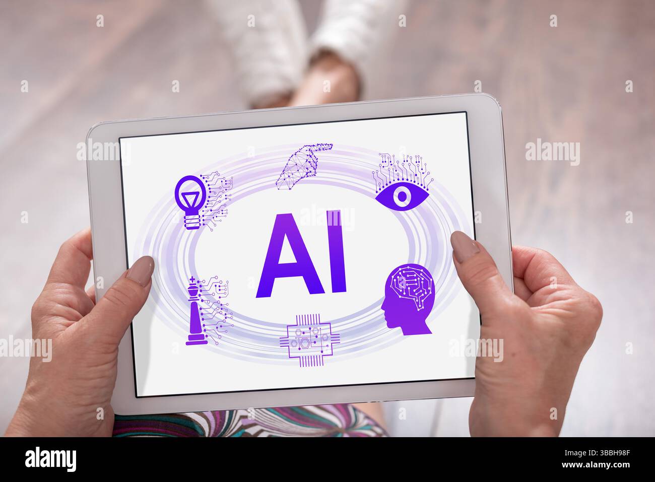 Artificial intelligence concept shown on a tablet held by a woman Stock ...