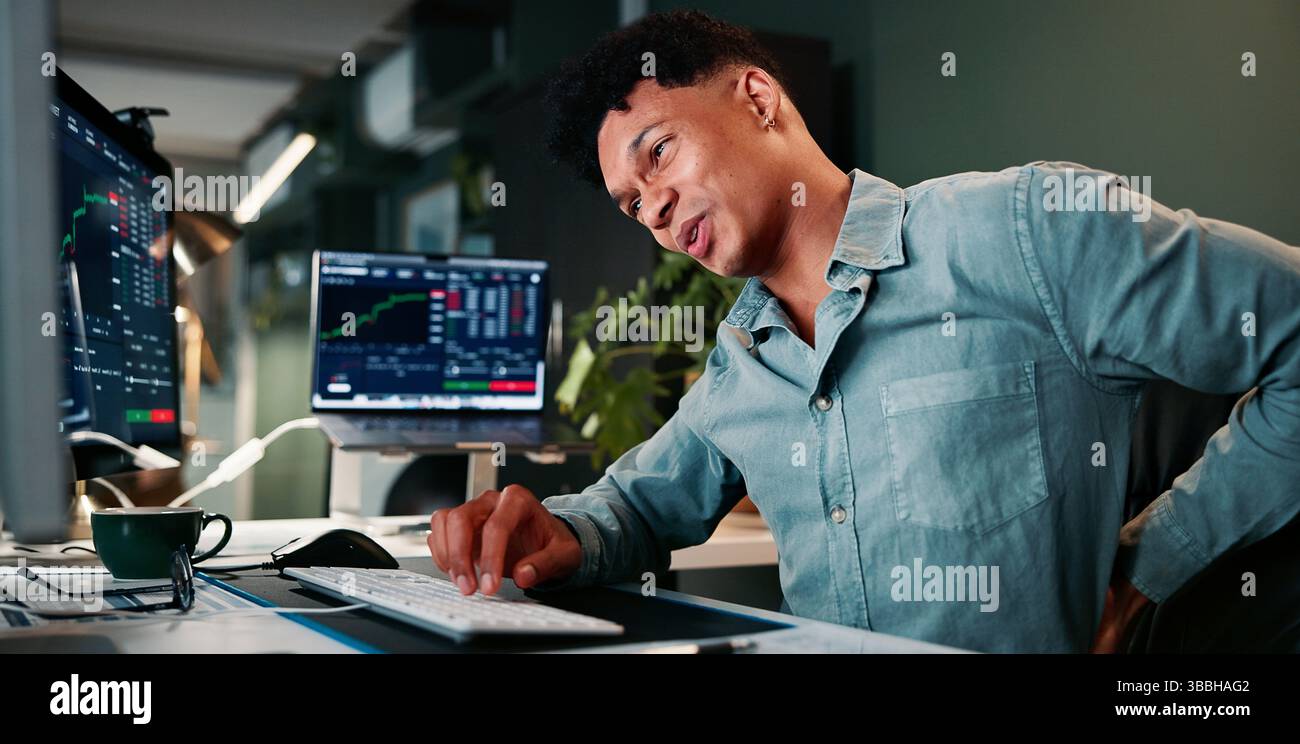 Man, back pain and computer screen with trading, stress and charts for ...