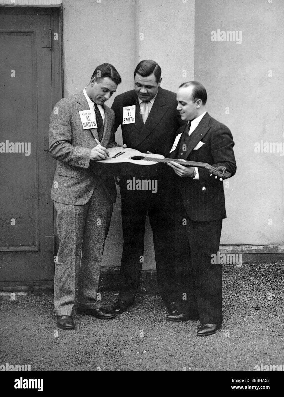 Lou Gehrig signing a guitar with Babe Ruth watching. Vote for Al Smith ...