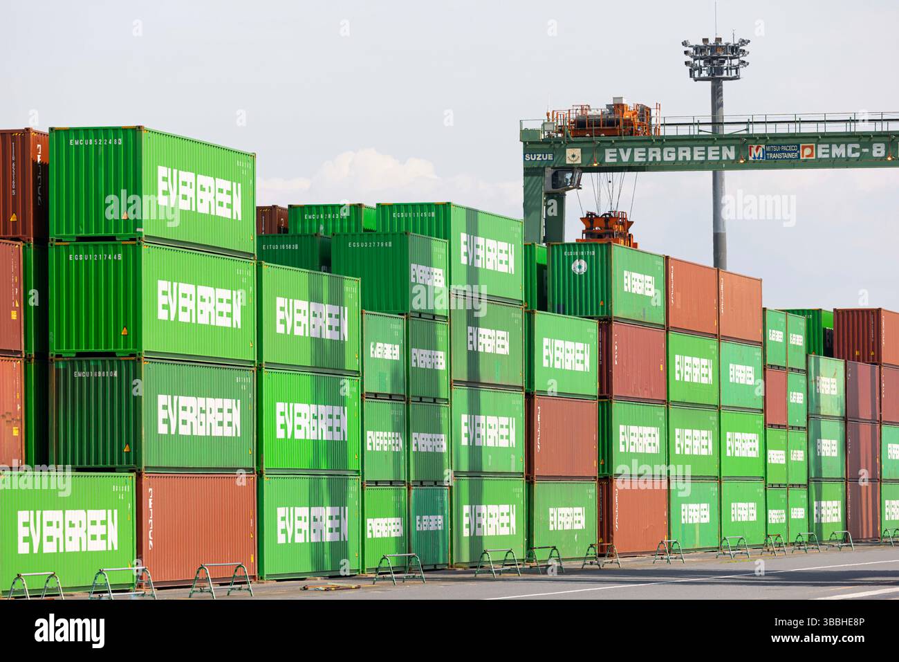 Shipping container loads dock at Tokyo Bay. Japan is heavily reliant on ...