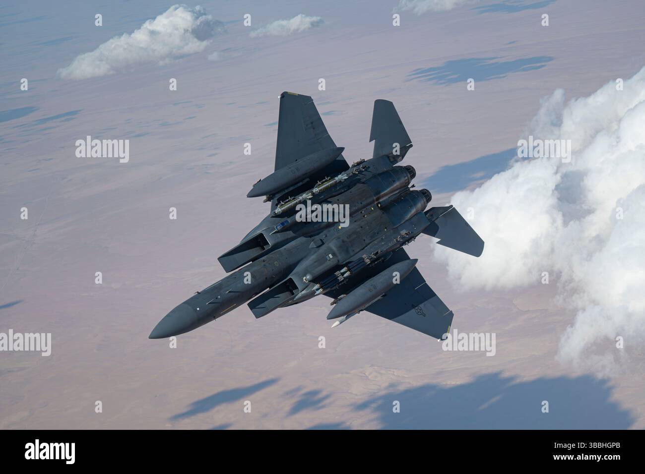 A U.S. Air Force F-15E Strike Eagle returns to combat air patrol after ...