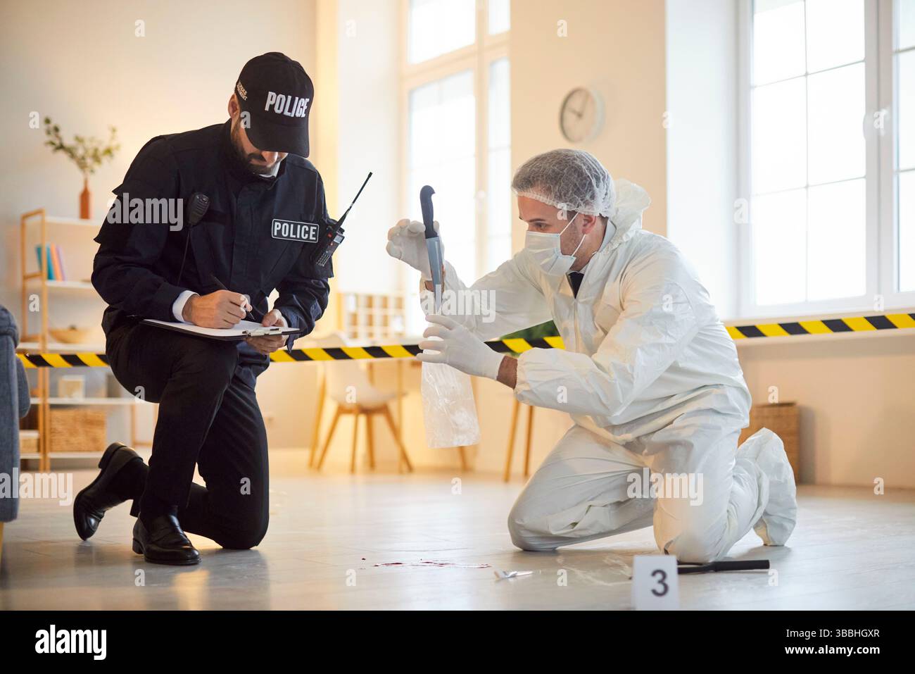 Detective And Criminalist Collecting Evidence At Crime Scene Finding Knife Stock Photo - Alamy