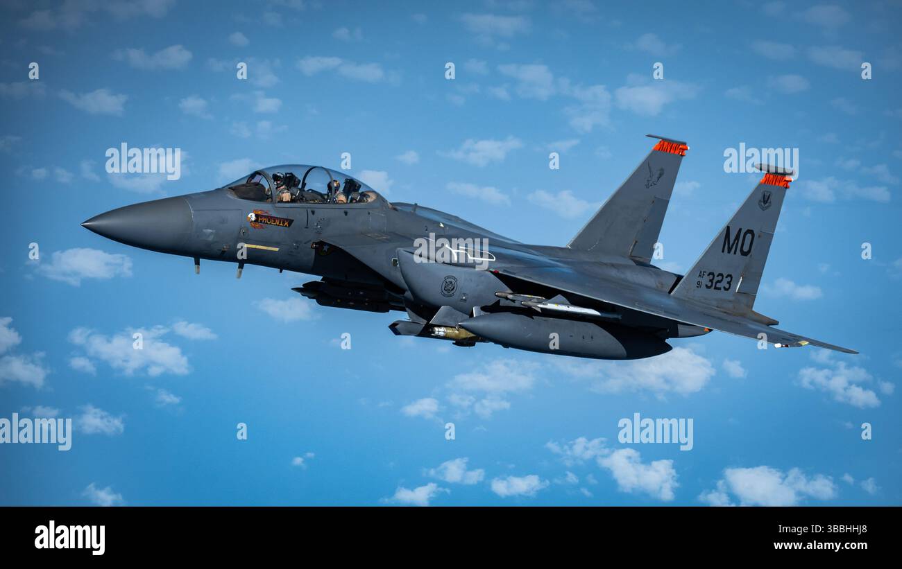 A U.S. Air Force F-15E Strike Eagle conducts a combat air patrol in the ...