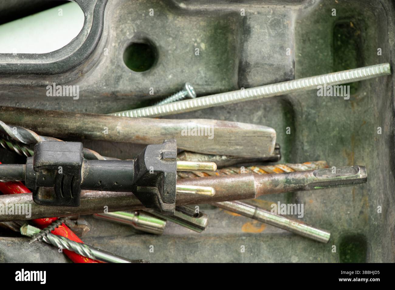 Nozzles and drills in a toolbox for a drill, working tools Stock Photo ...