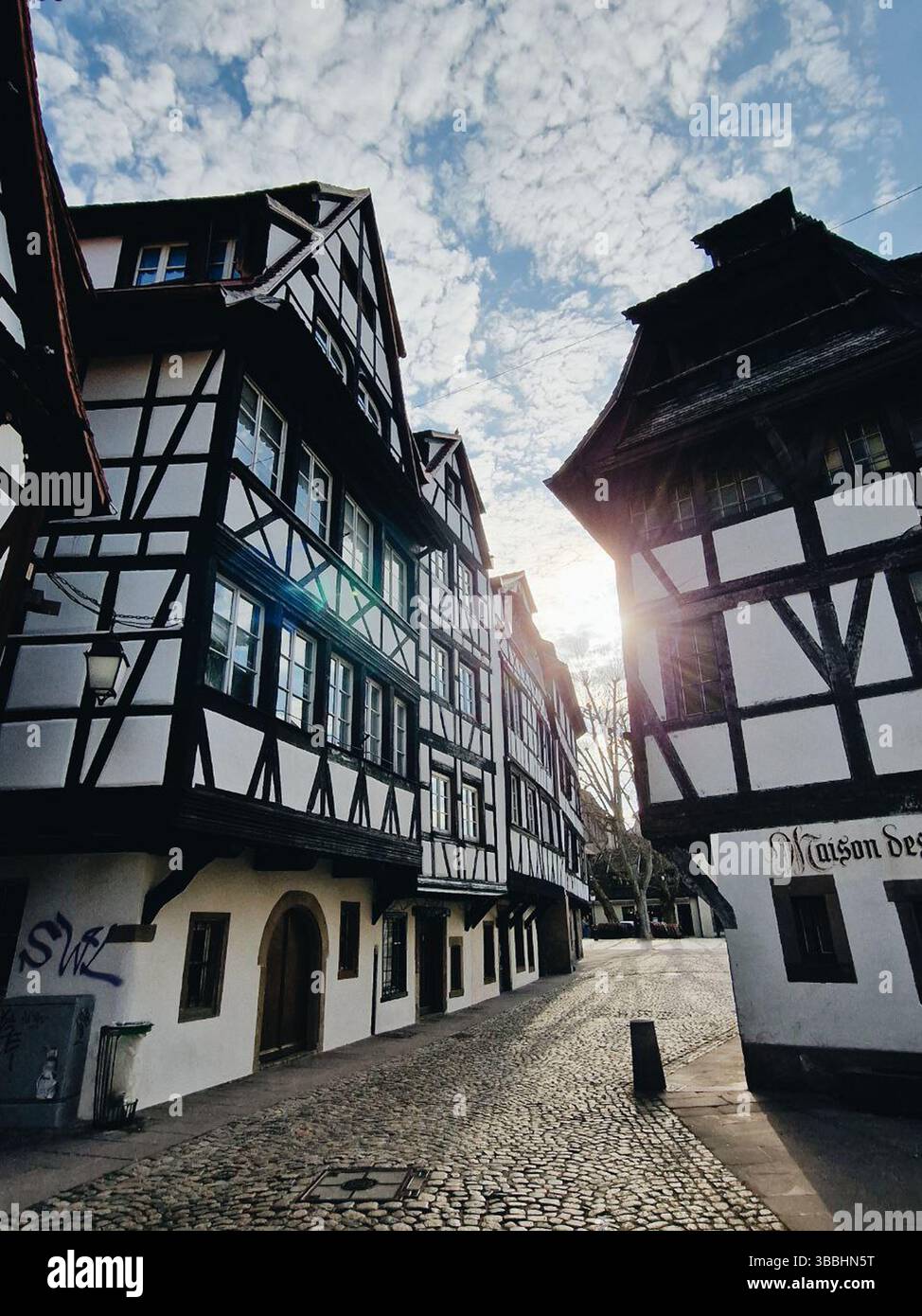 Historic buildings with timber frames lining a cobblestone street Stock ...