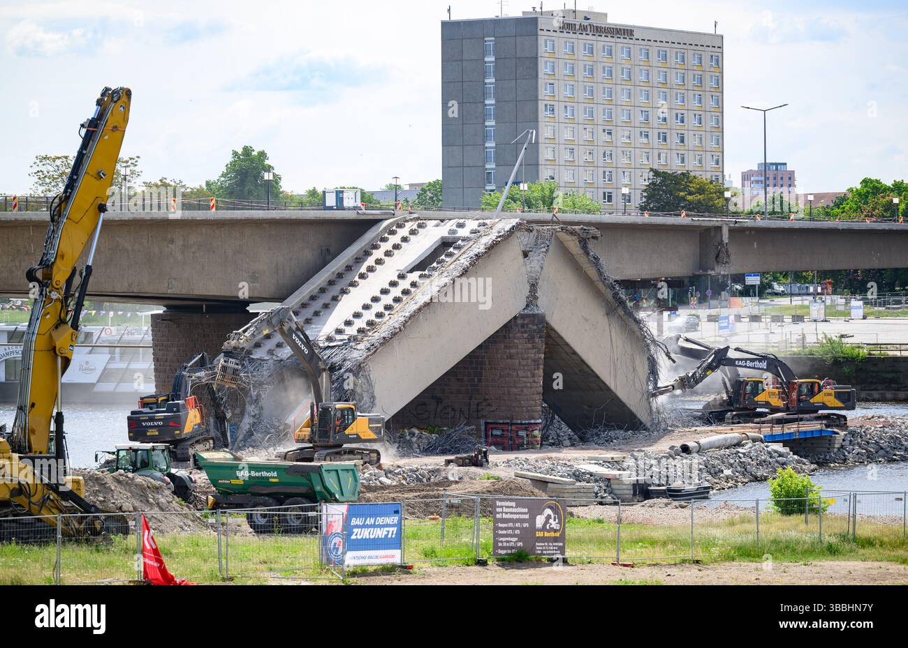 Dresden, Germany. 16th May, 2025. Excavators are used to demolish the ...