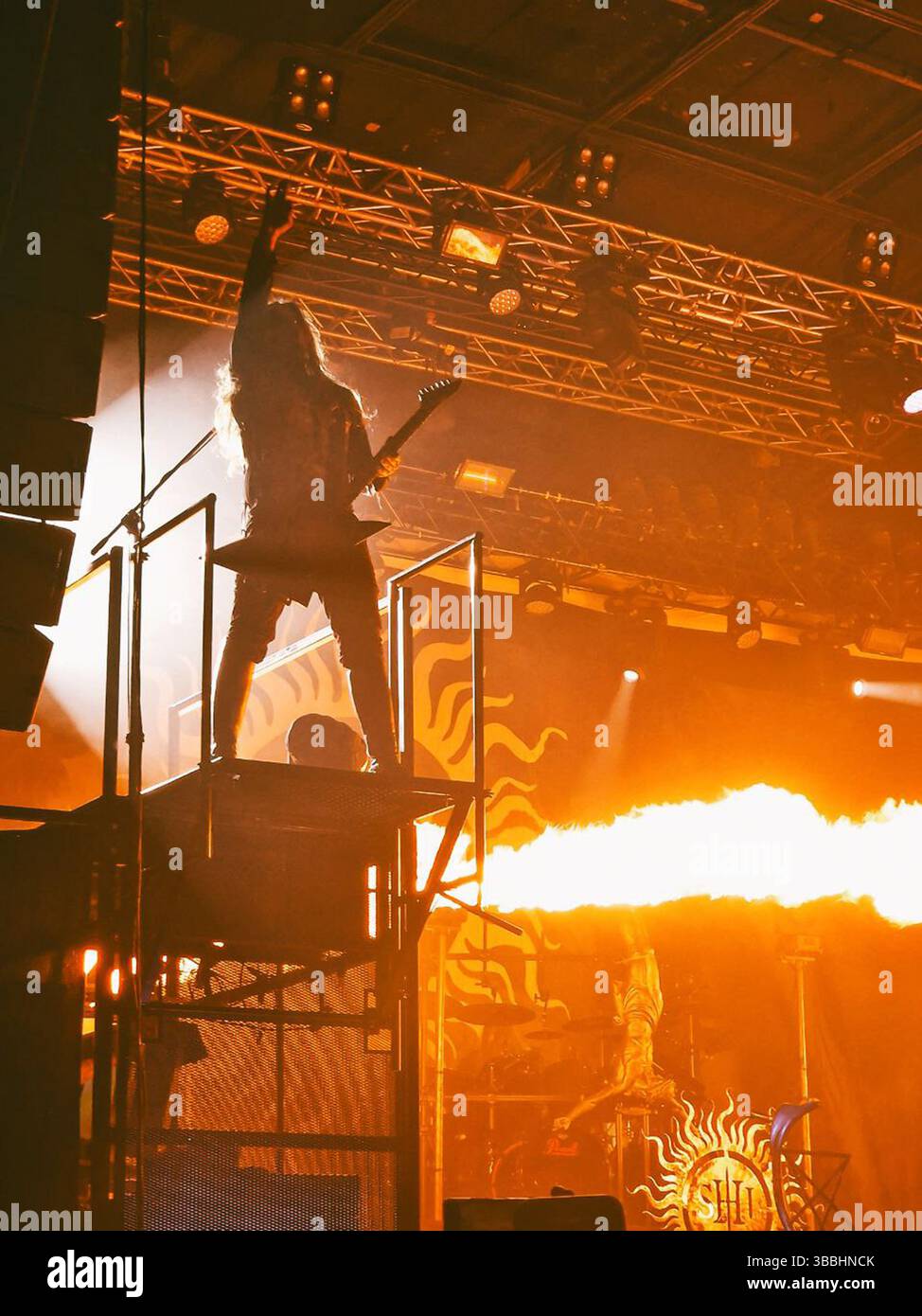Guitarist performs on stage with pyrotechnics at a rock concert Stock ...