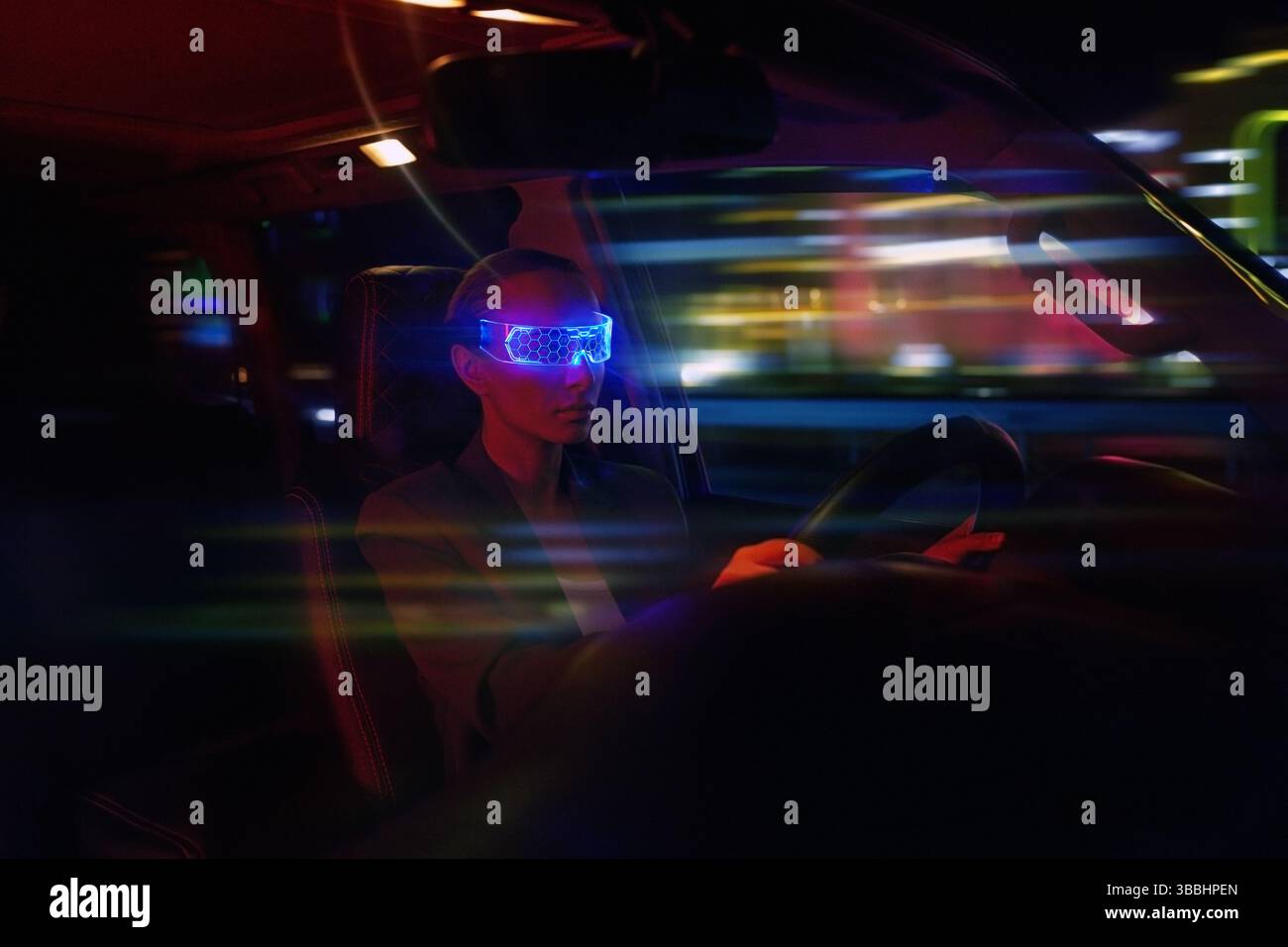 Woman in Futuristic High-tech VR Eyewear driving car in night ci Stock ...