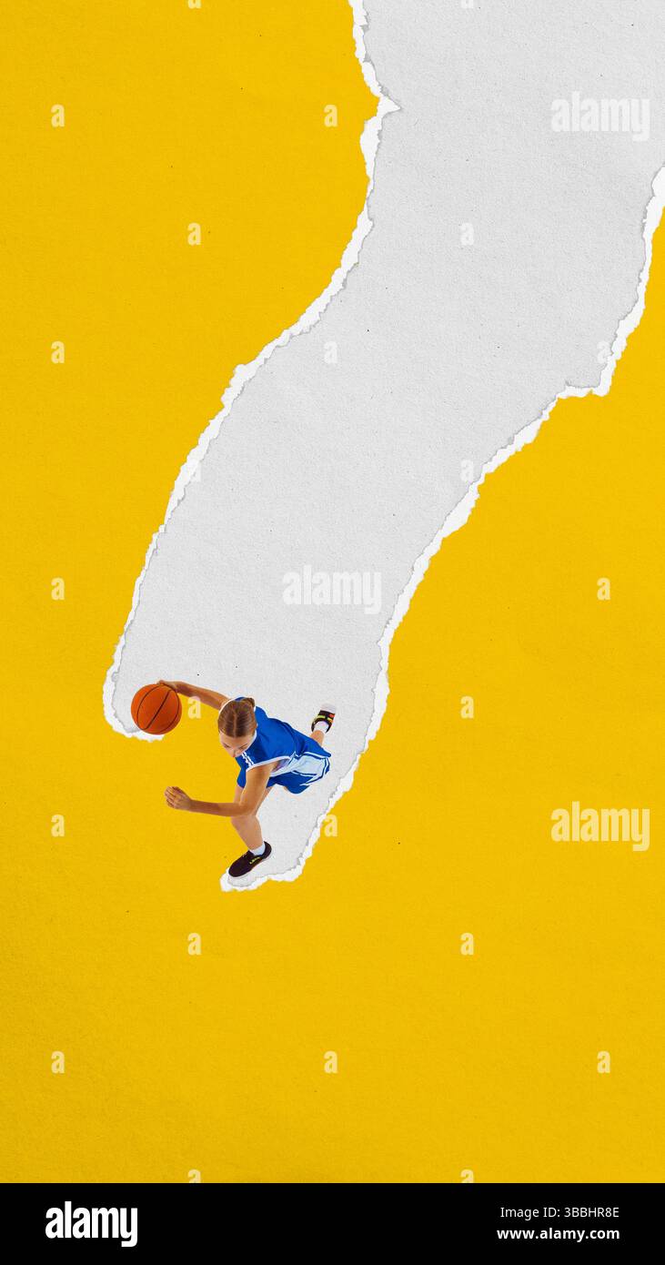 Female basketball player in blue uniform moves dynamically on ripped ...