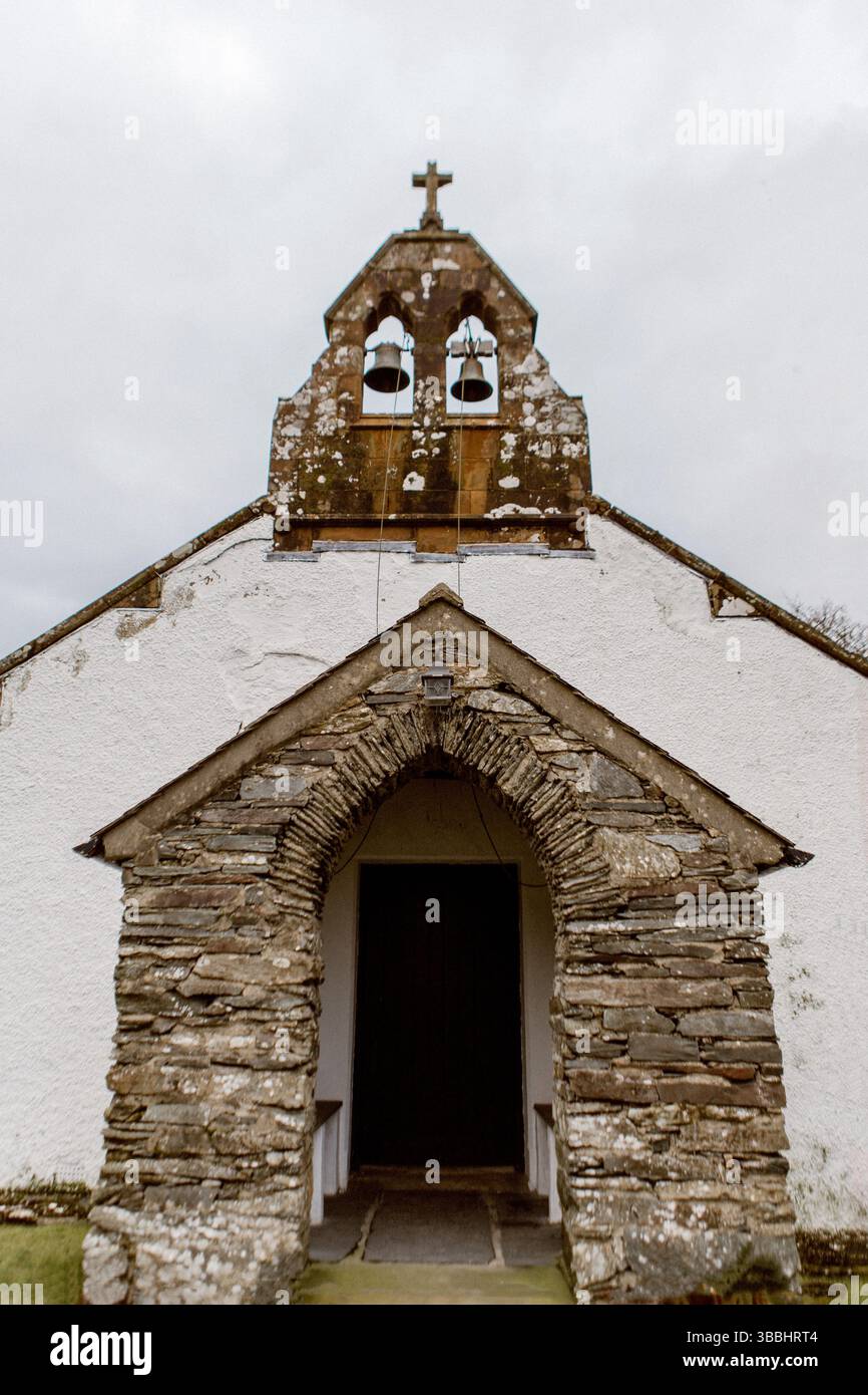 Stone-arched entrance of St John’s Church in Ulpha, England Stock Photo ...