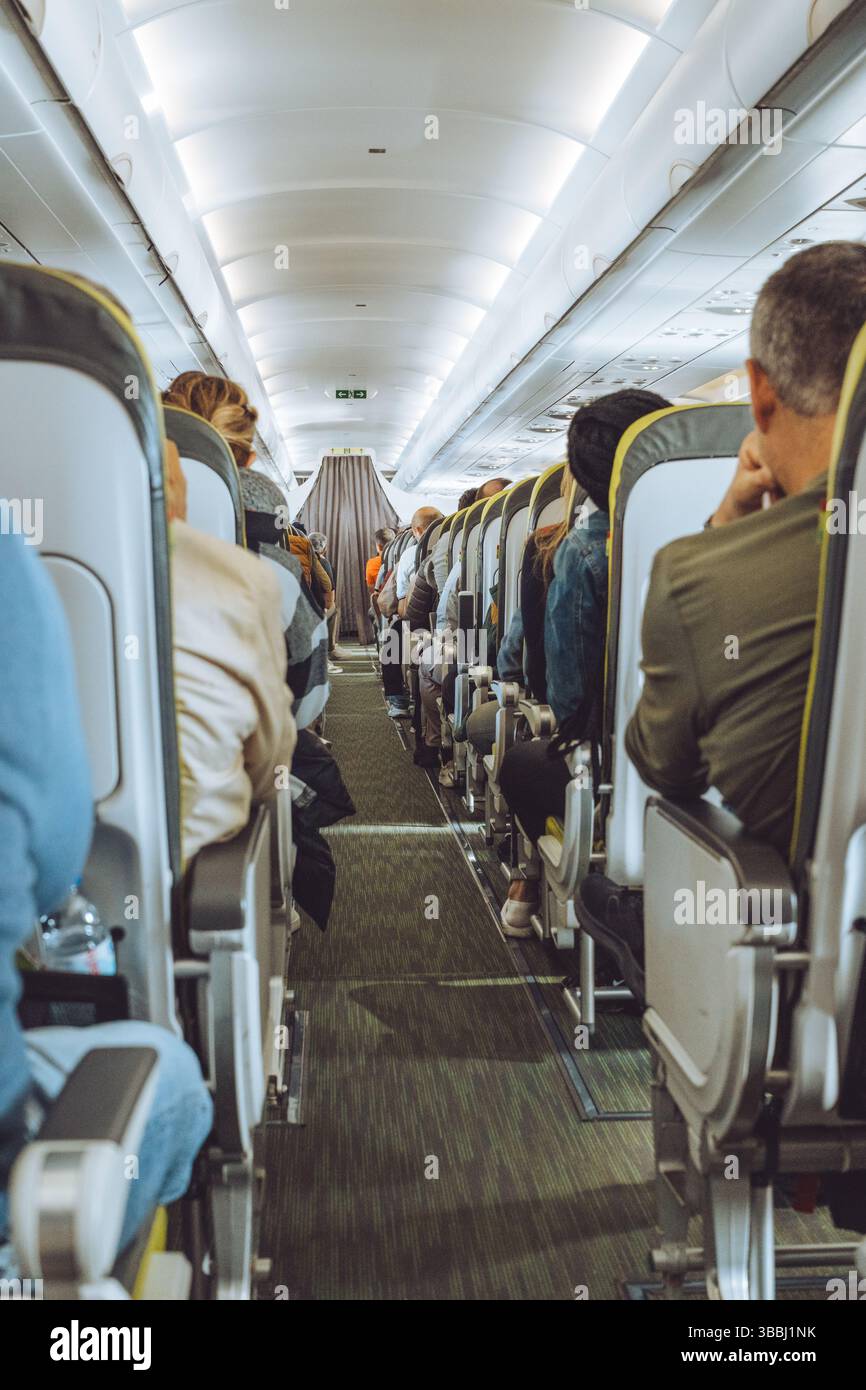 Inside Airplane, Rows, Aisle, Passengers Stock Photo - Alamy