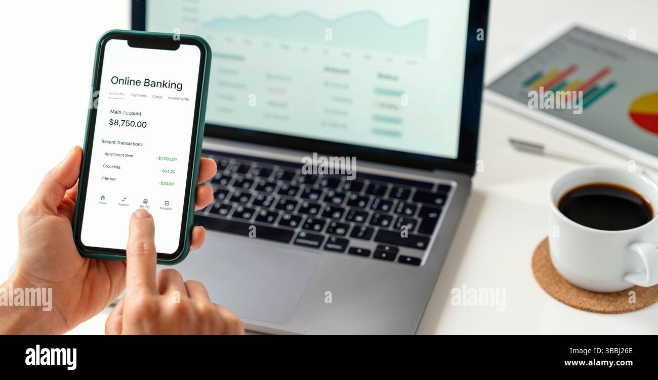 User making financial transaction using online banking app on ...