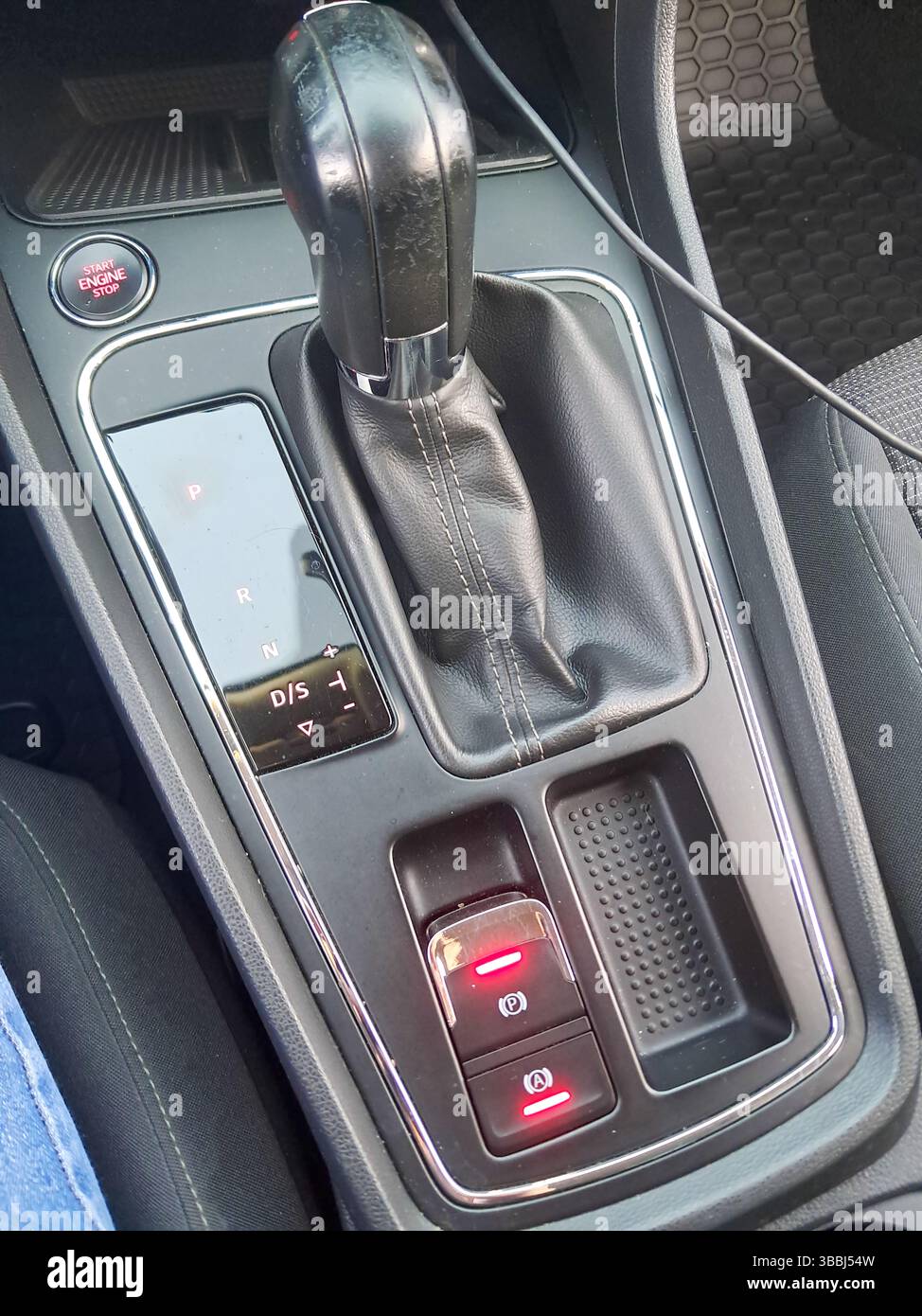 Close up of the automatic gearbox and electronic parking brake of a seat leon car, highlighting ...