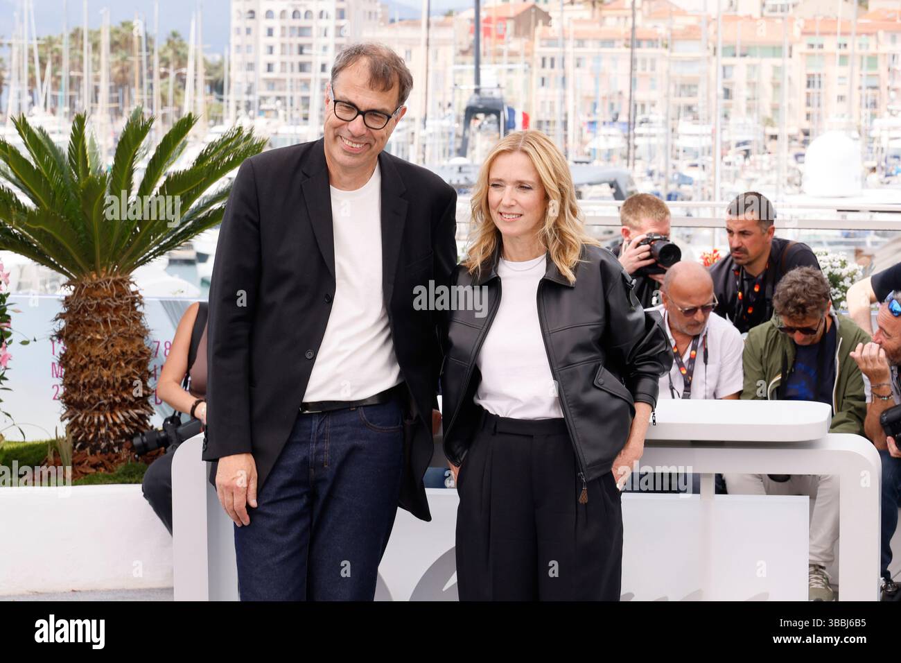 Director Dominik Moll, left, and Lea Drucker pose for photographers at ...