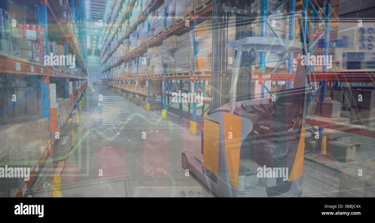 Electric pallet jack idling in warehouse aisle, with metal shelving ...