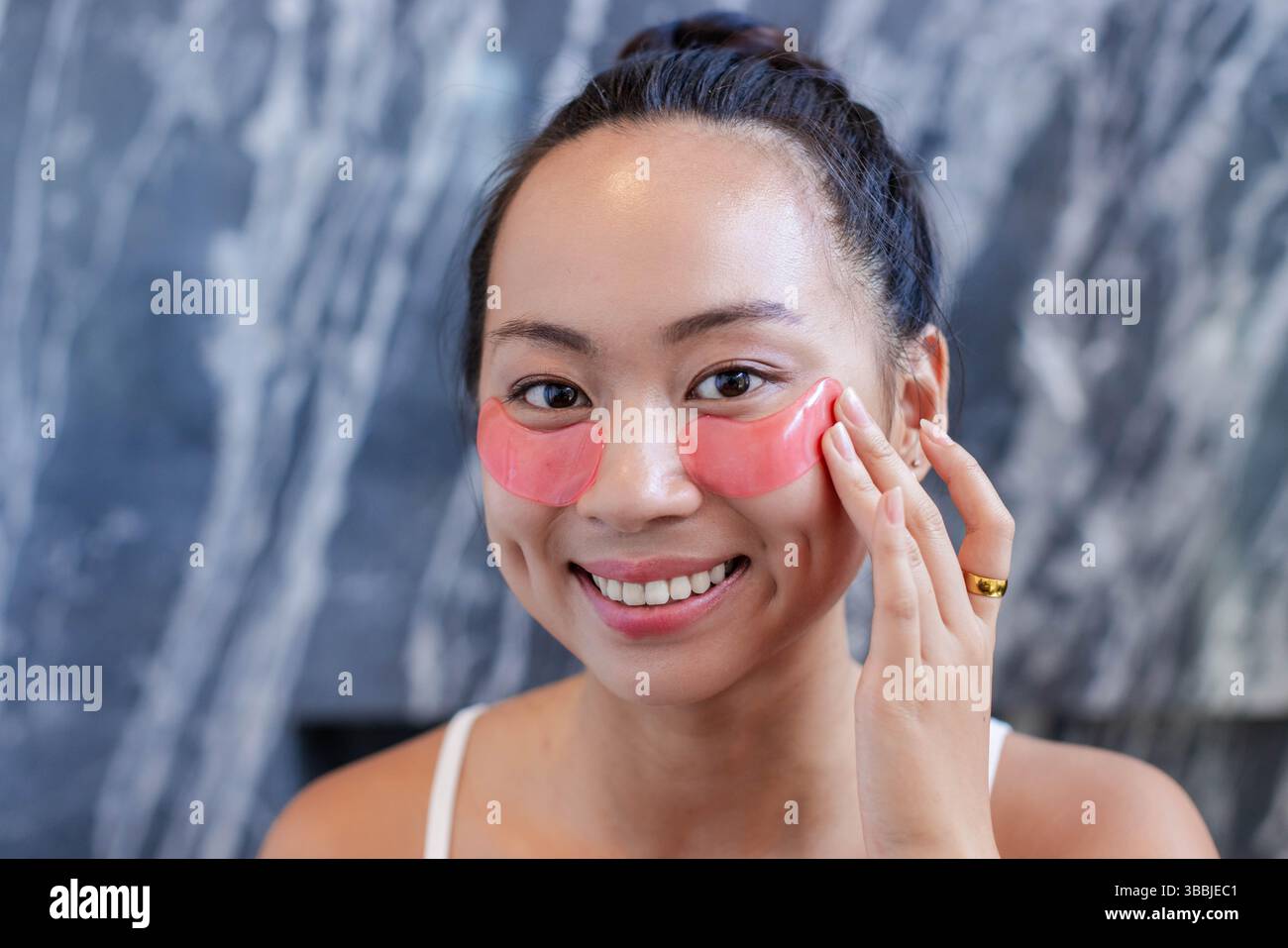 Asian woman applying pink eye hi-res stock photography and images - Alamy