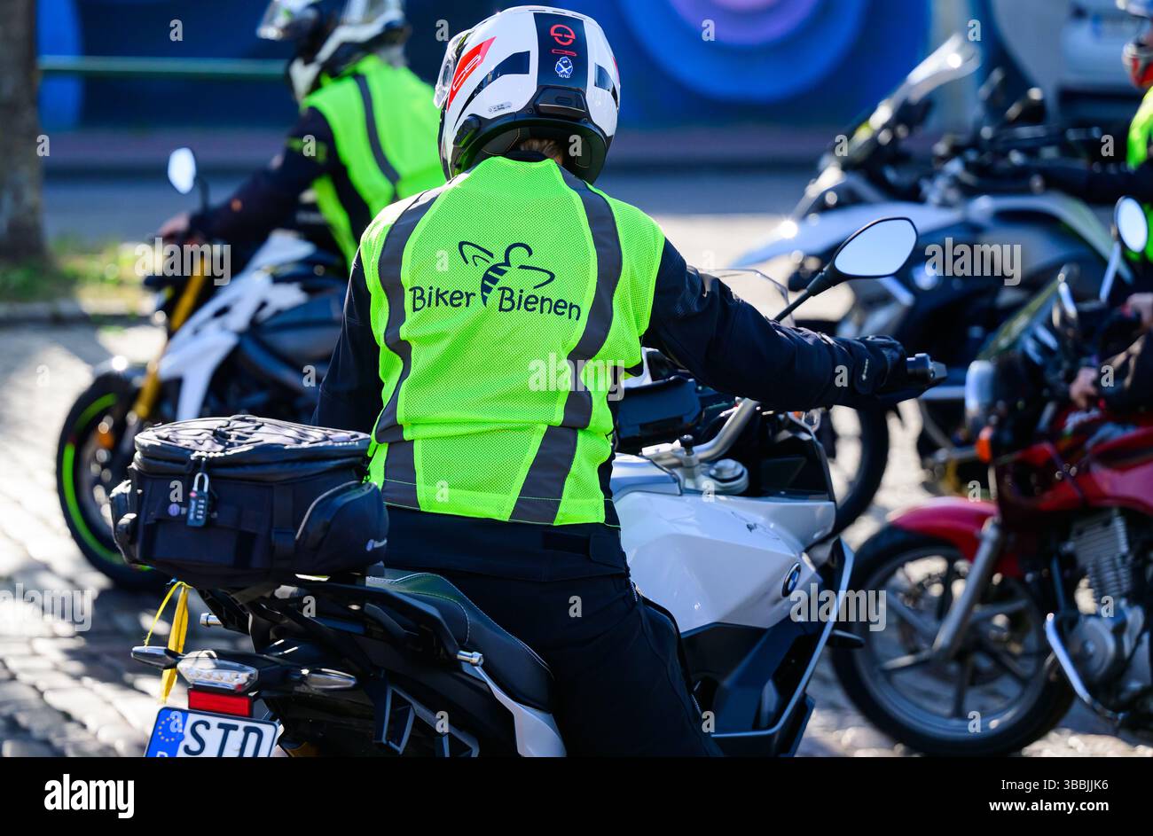 Stade, Germany. 13th May, 2025. The "biker bees" ride their motorcycles ...