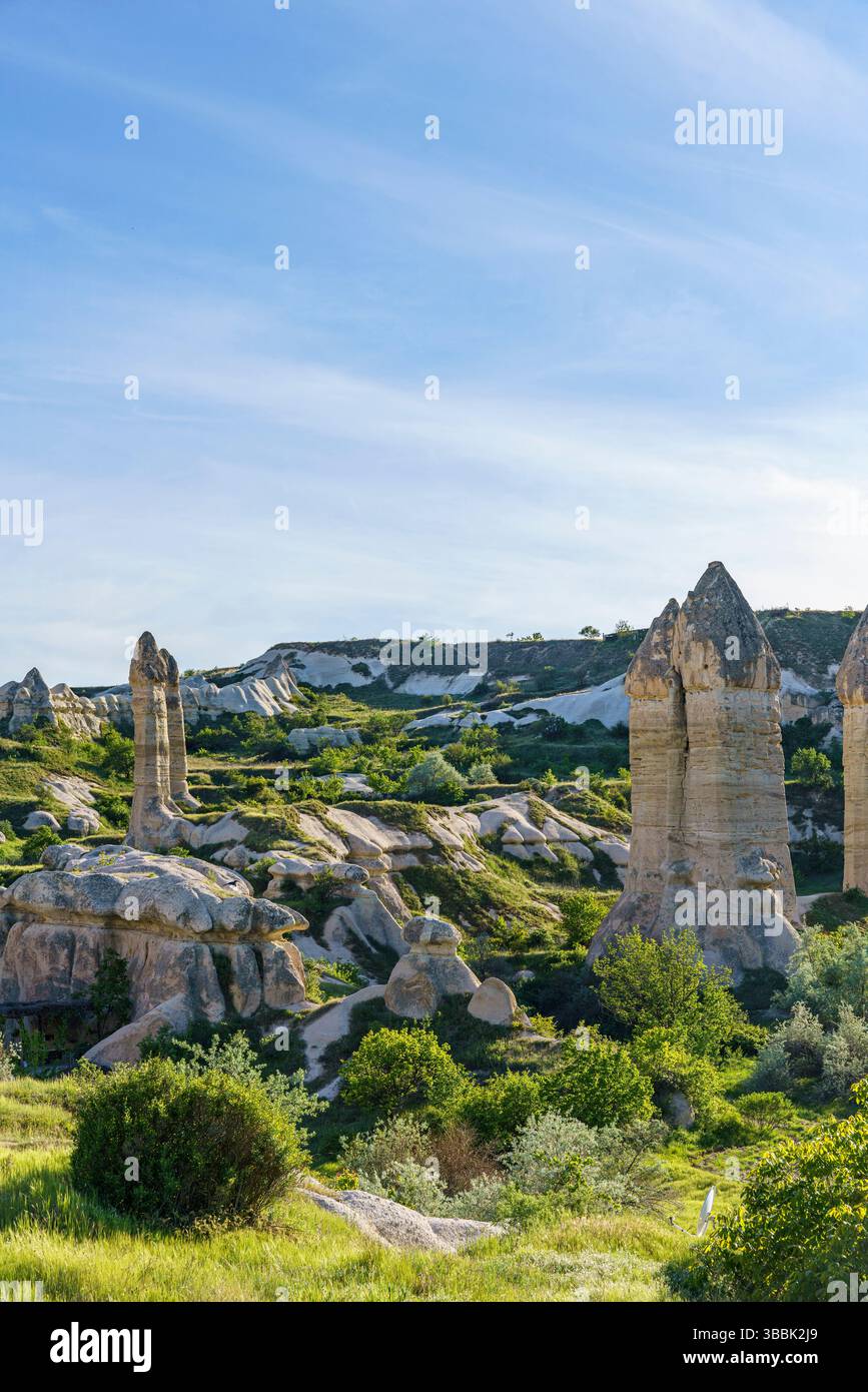 Fairy chimneys and green meadows stretch across the slopes of ...