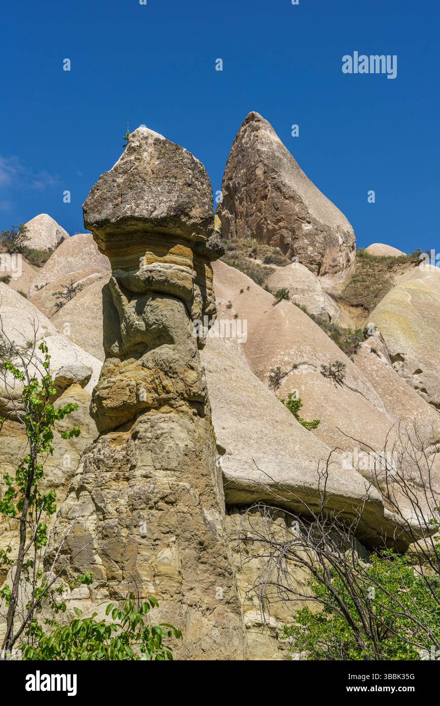 Two tall rock spires stand side by side in Cappadocia's Meskendir ...