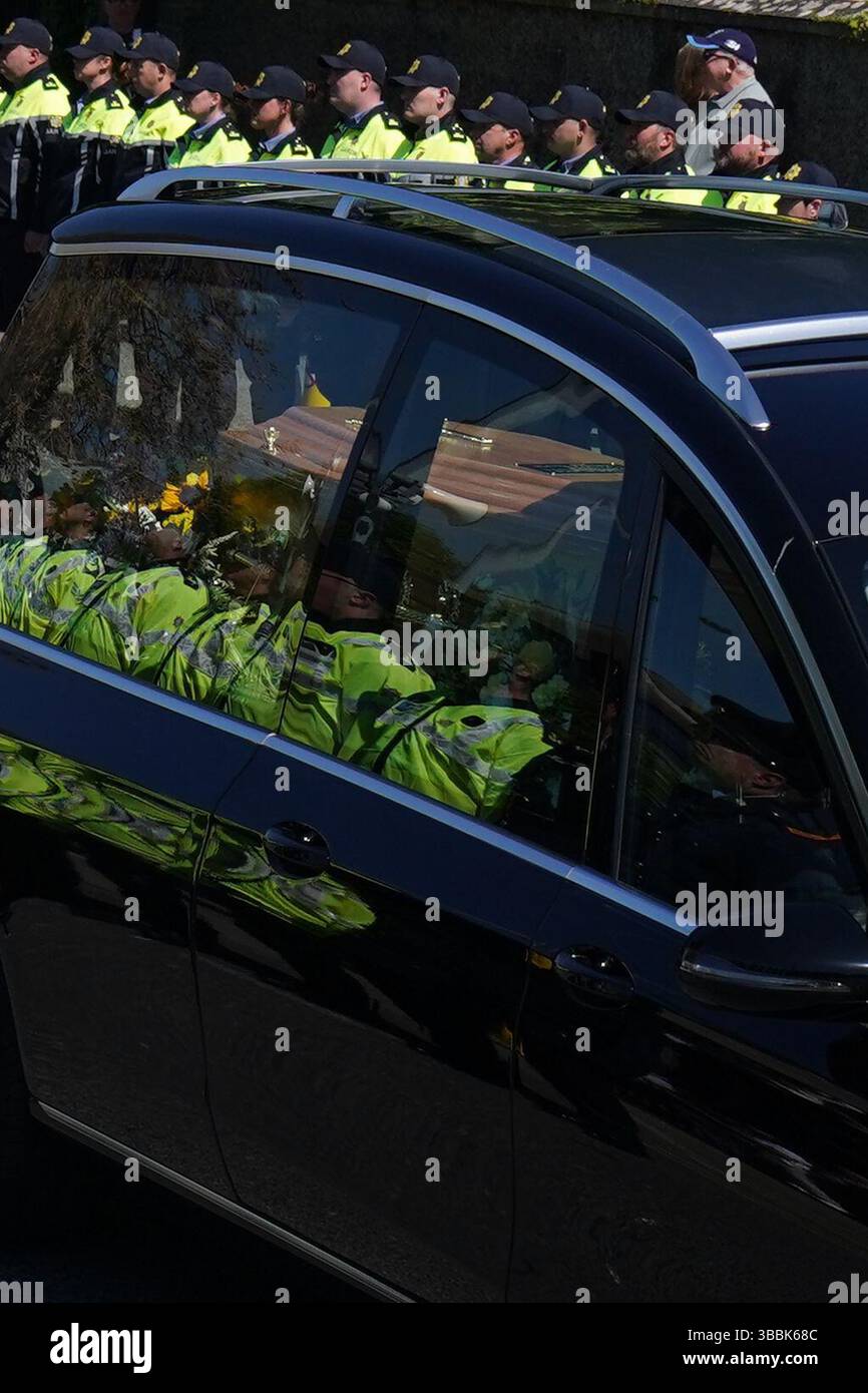 Garda officers line the route as the funeral cortege for Garda Kevin ...