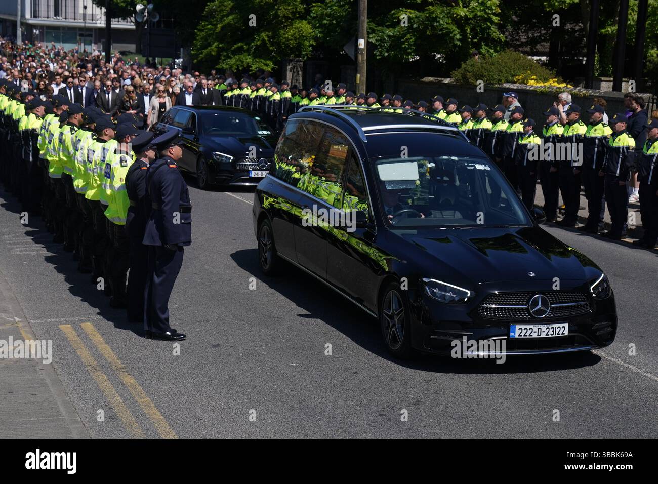 Garda officers line the route as the funeral cortege for Garda Kevin ...