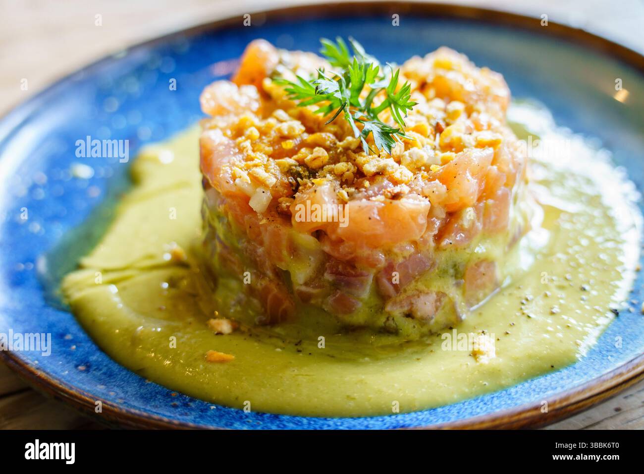 Cured salmon tartar with "acevichado" avocado and toasted corn dressing ...
