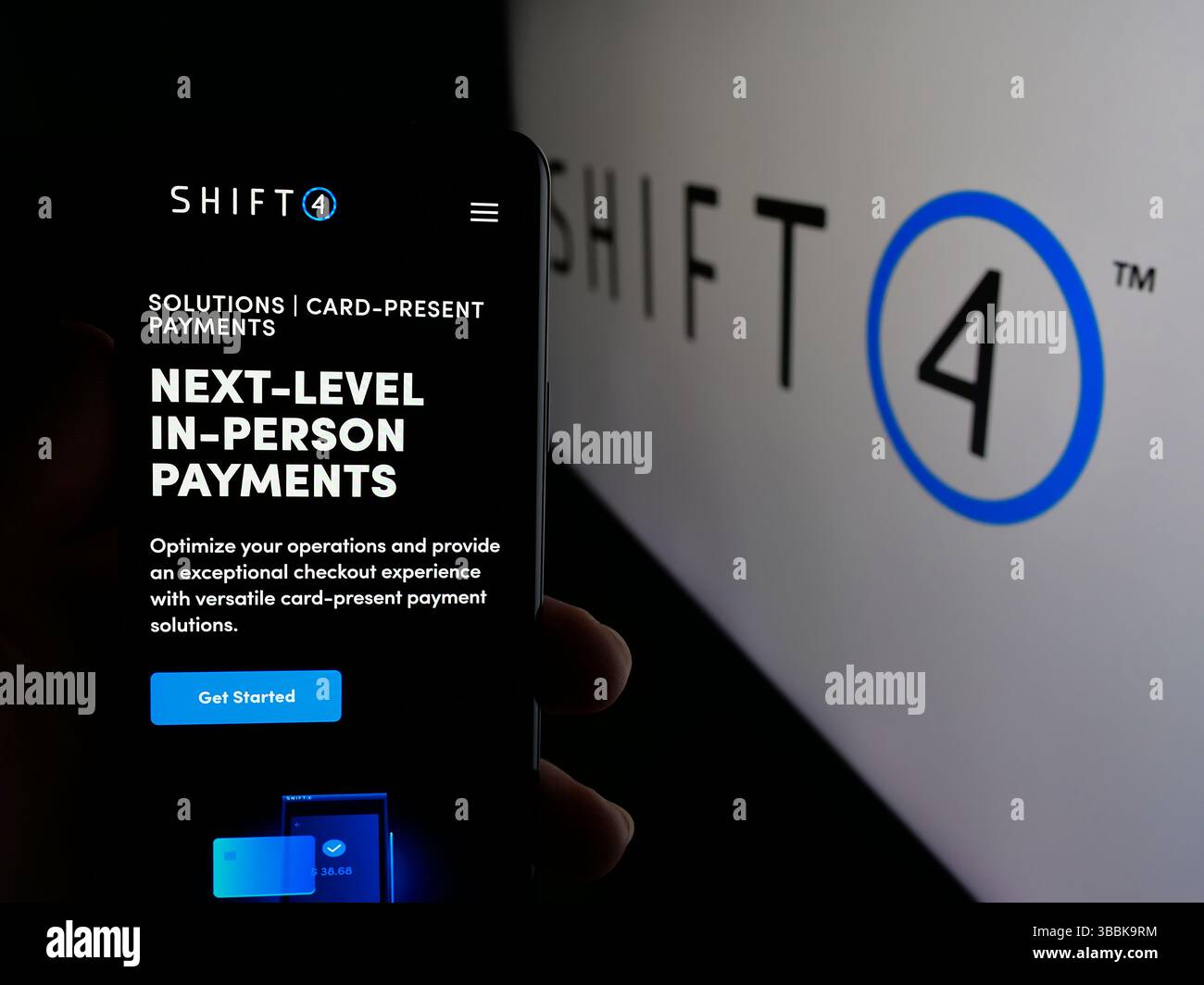 Stuttgart, Germany - 01-08-2024: Person holding smartphone with web page of US financial company ...