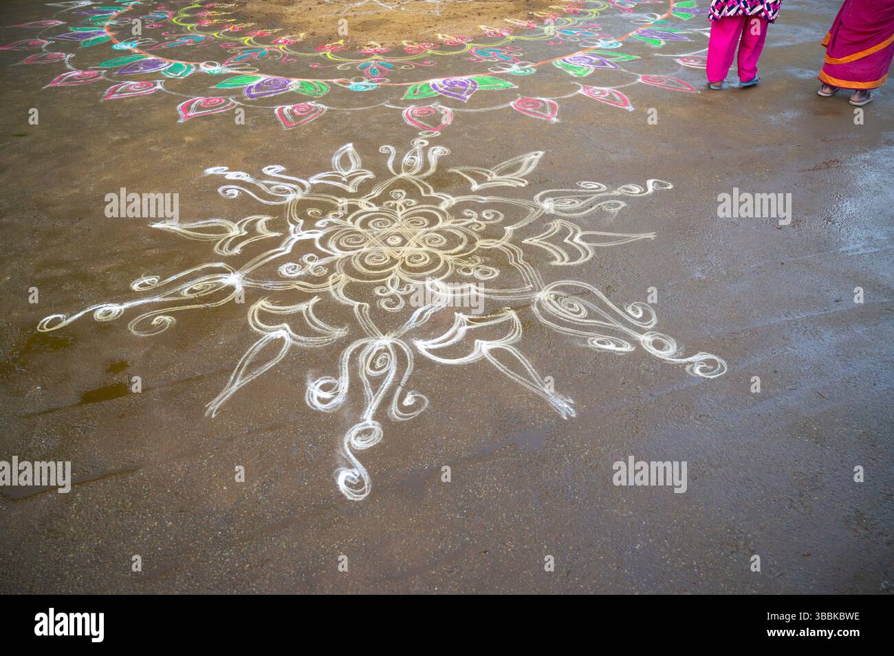 Kolam, colorful sandpainting with rice powder drawn by women and girls ...