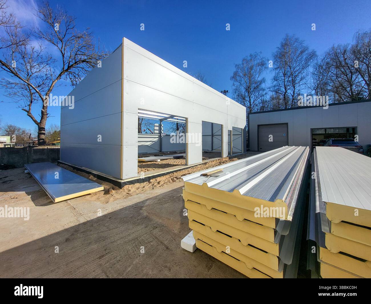 Prefabricated industrial building under construction. Steel frame and ...