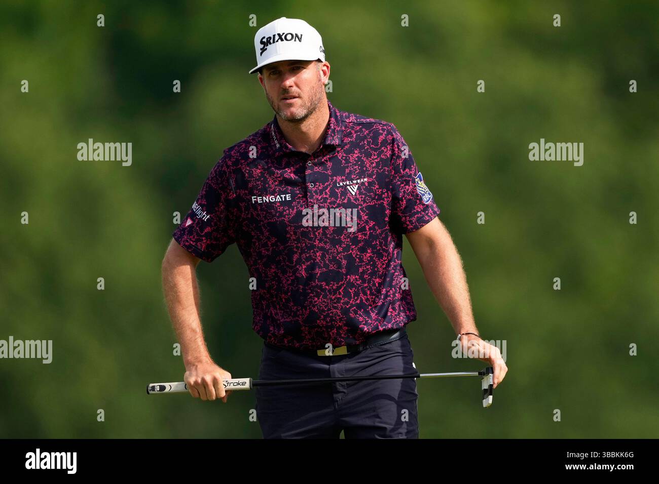 Taylor Pendrith, of Canada, lines up a putt on the fifth hole during ...