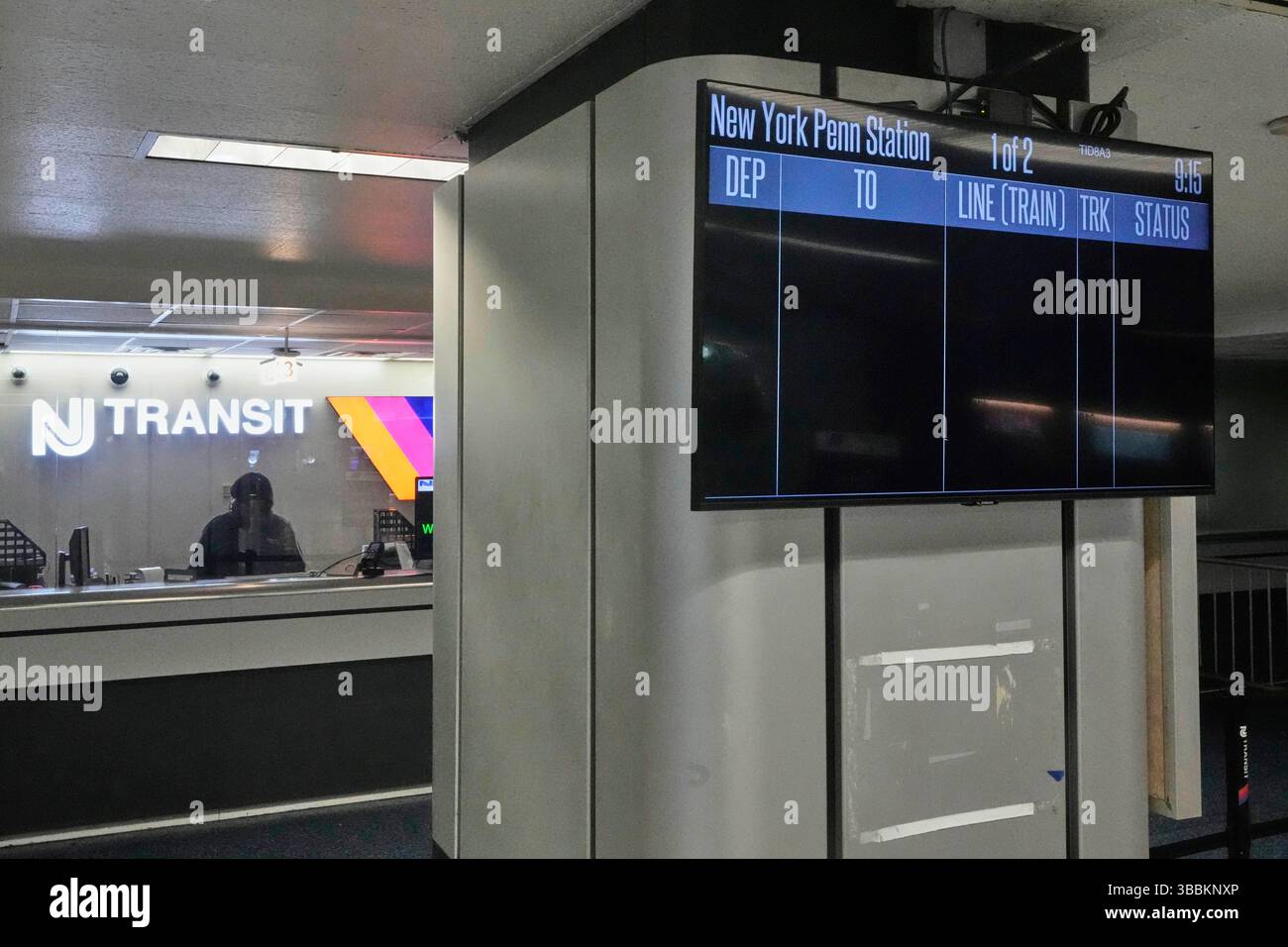 The NJ Transit train track information screen in the ticketing area at ...