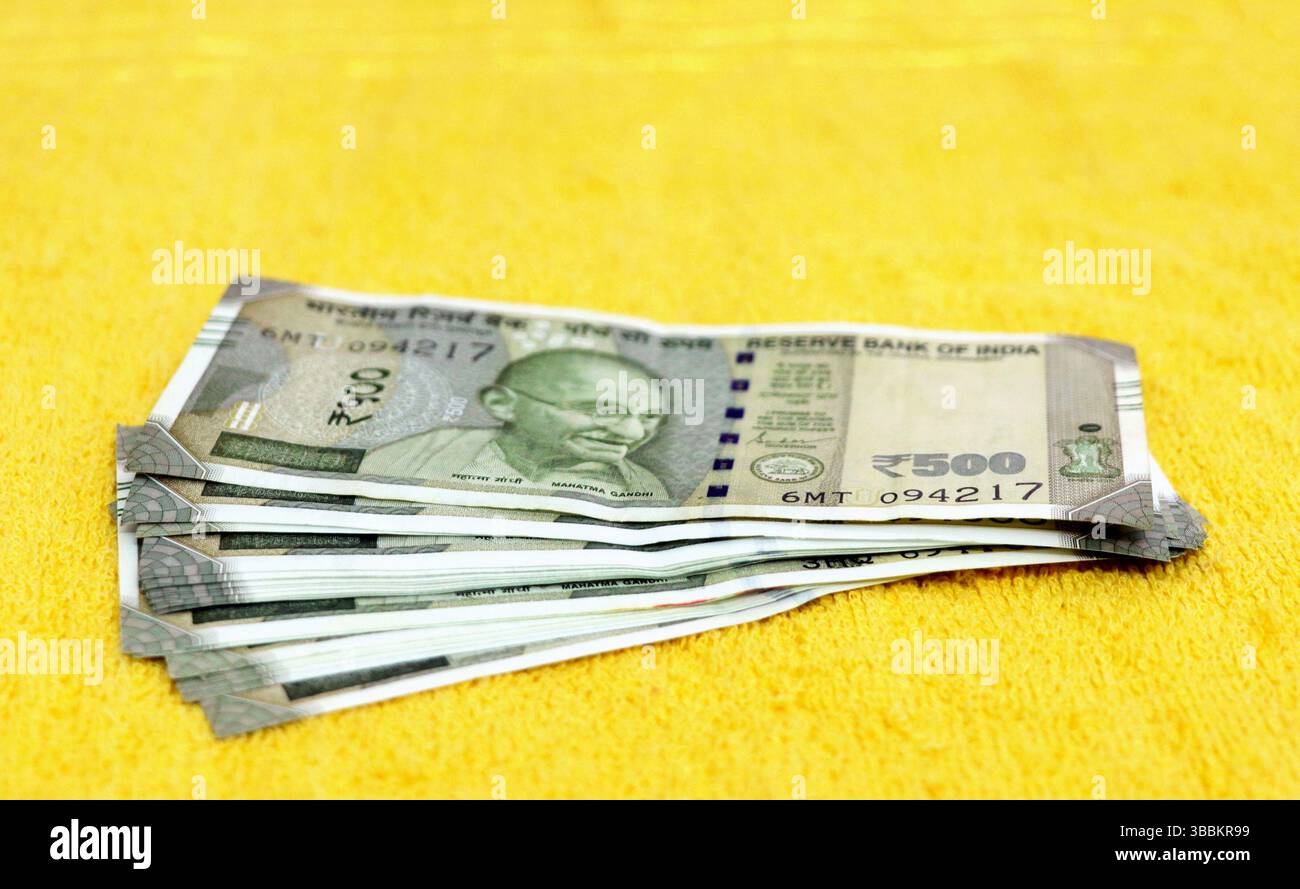 A closup of fanned out spread out Indian Rupees currency paper notes ...