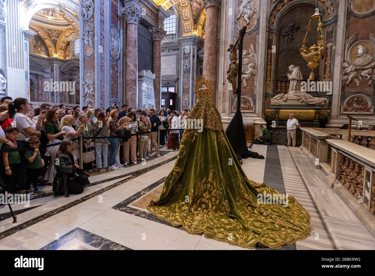 Jubilee Saint Peters Basilica - Holy door People look at a statue of ...