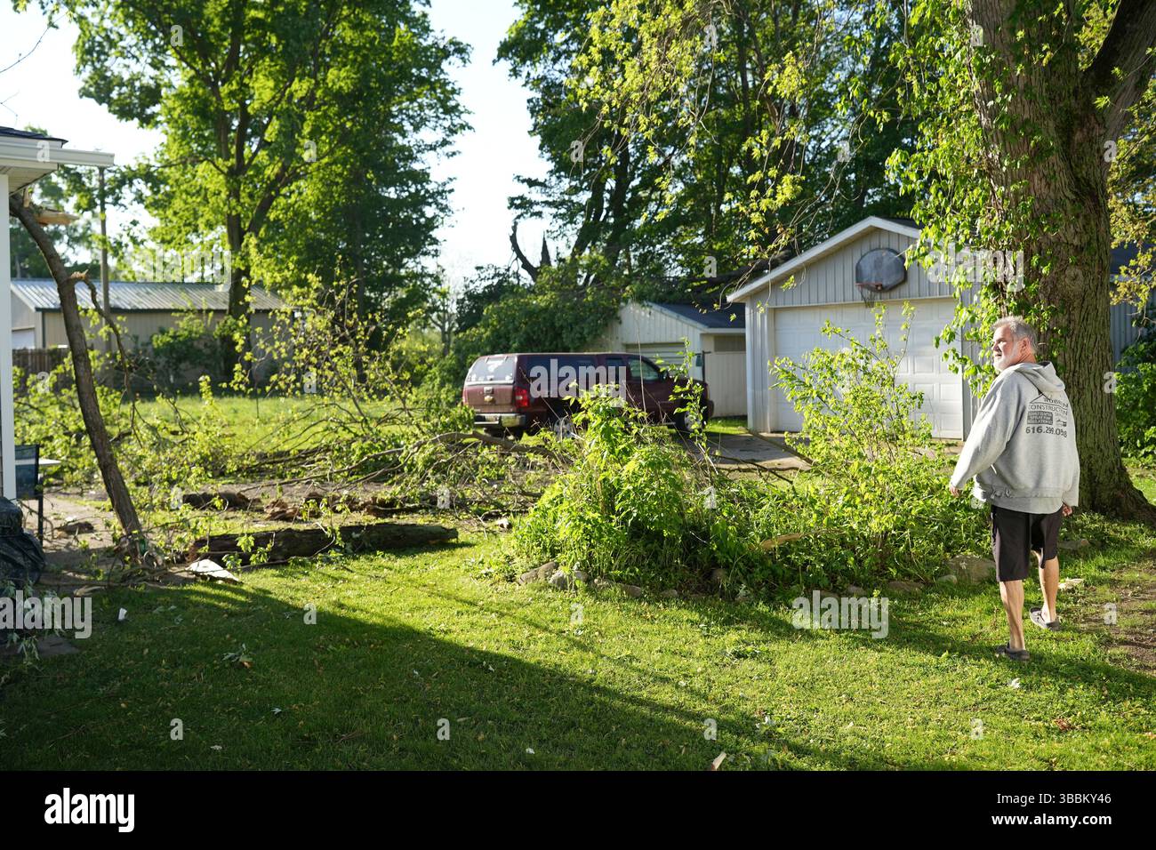 Trees and debris cover the ground in the aftermath of severe weather in ...