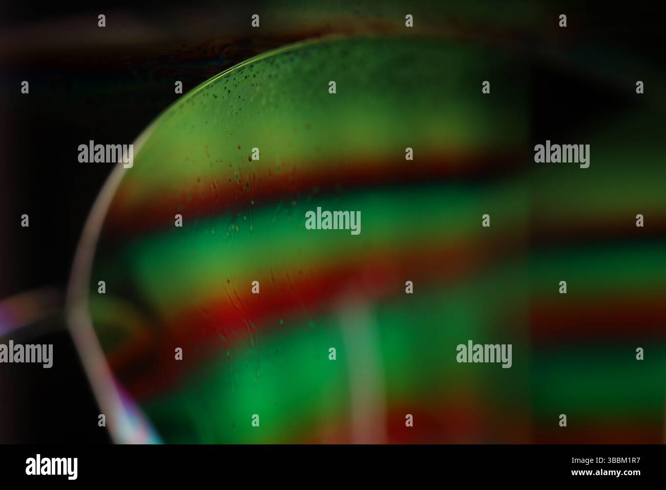 Green liquid surface, green Reflections of liquid in macro,, bubbles in ...