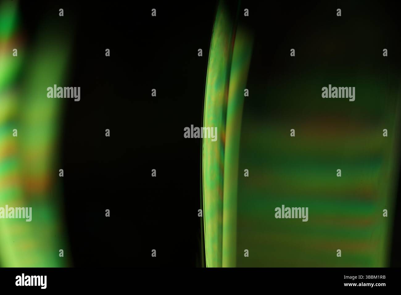 Green liquid surface, green Reflections of liquid in macro, bubbles in ...