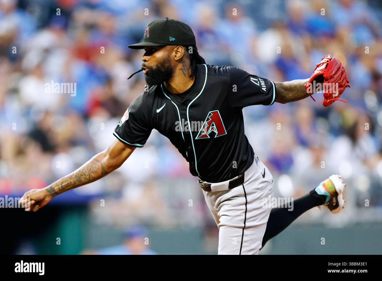 FILE - Arizona Diamondbacks reliever Miguel Castro follows through on a ...