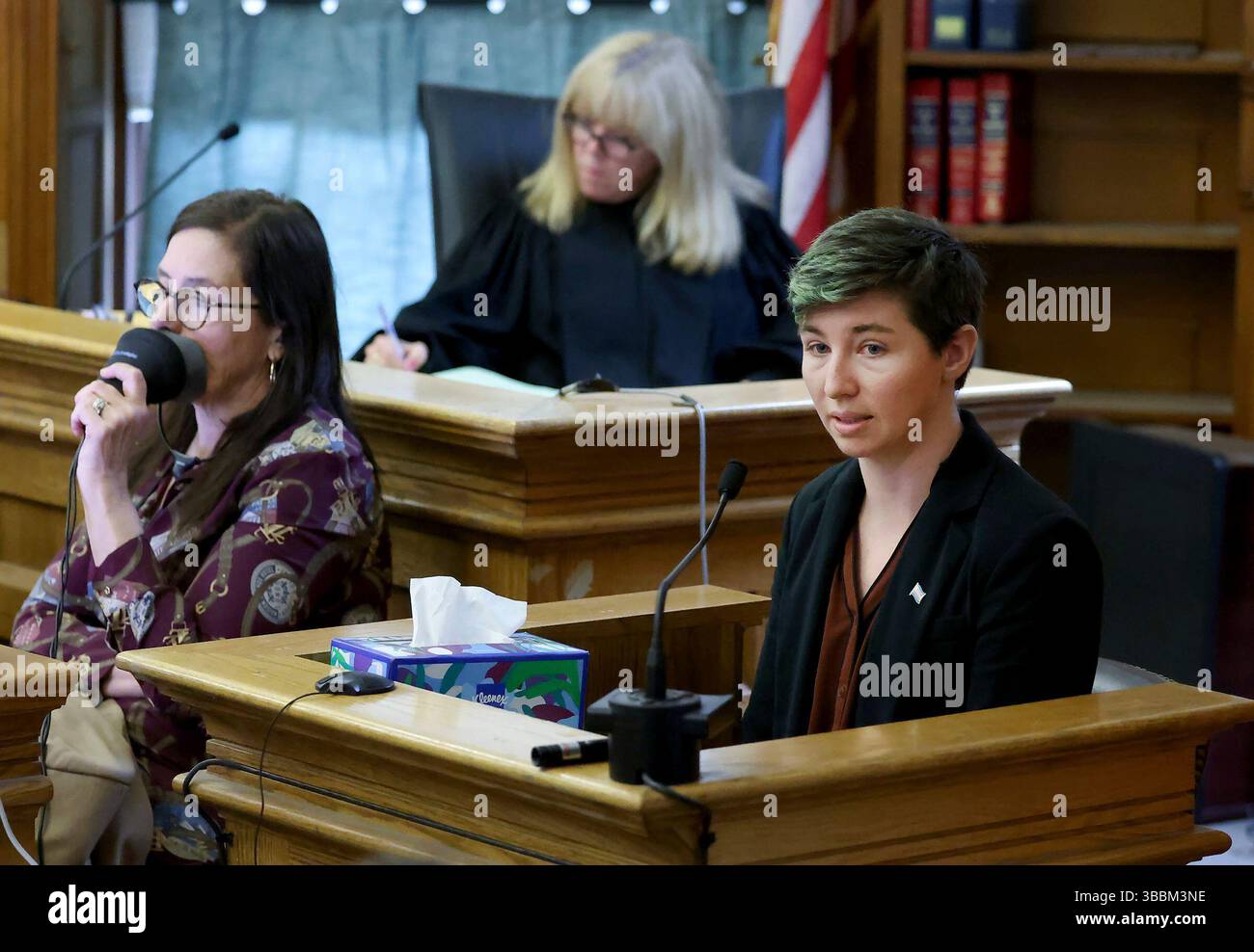 Ashley Vallier, right, a forensic scientist with the Massachusetts ...