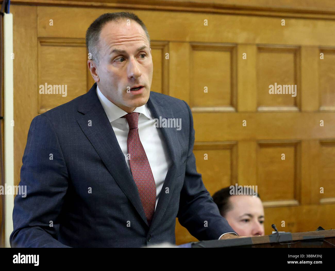Prosecutor David Yannetti listens as Andre Porto of the Massachusetts ...